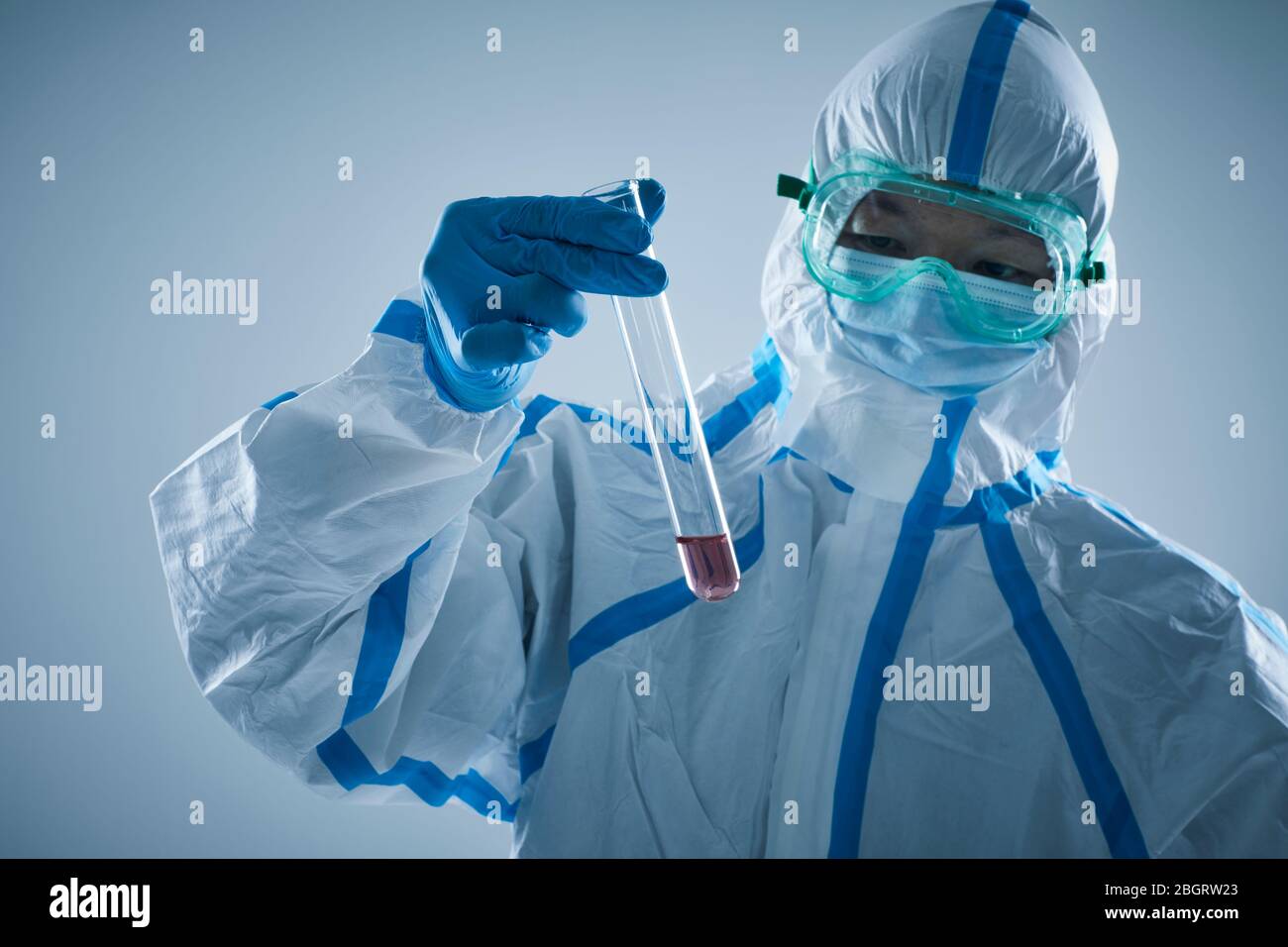 Japanese man wearing protective suit for disease prevention Stock Photo ...