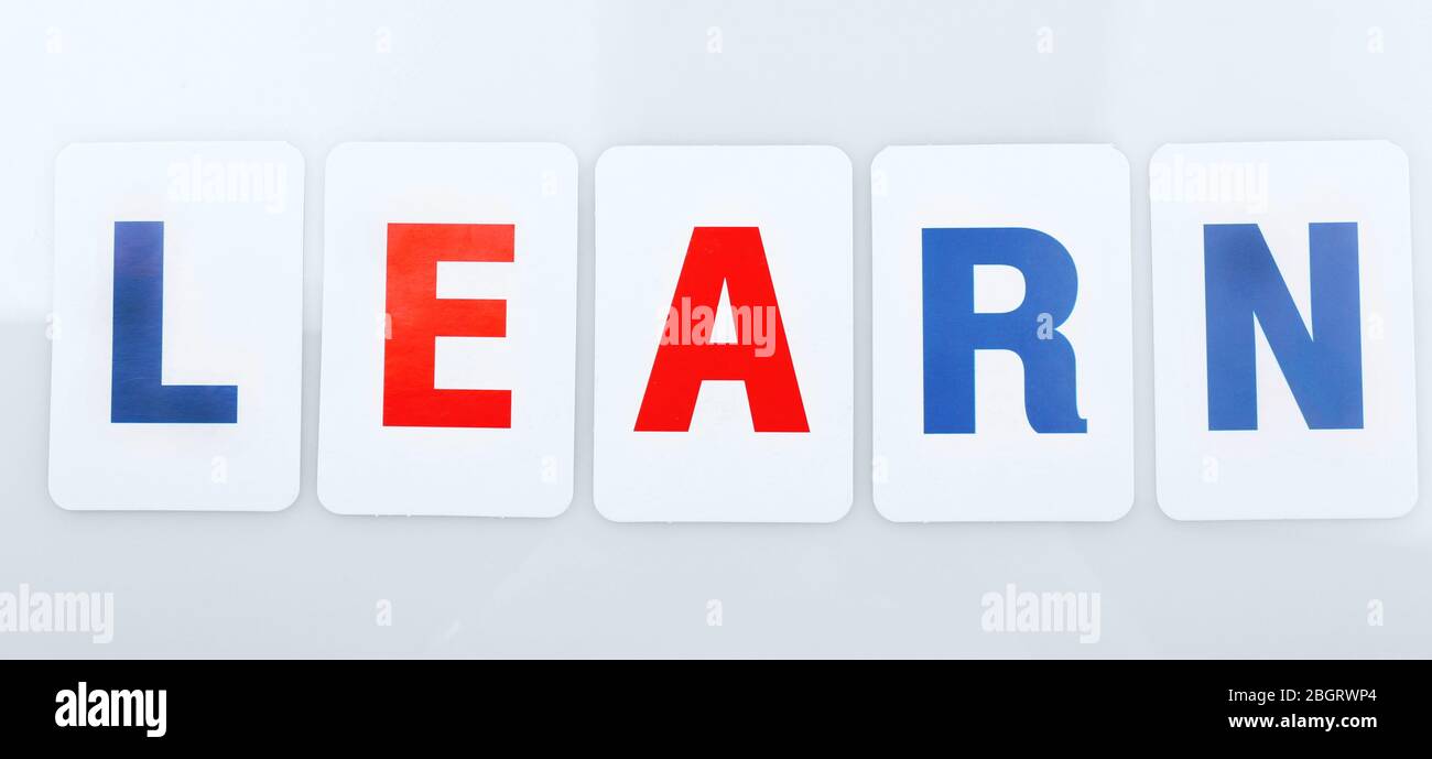 Learn word formed by educational paper cards isolated on white Stock ...