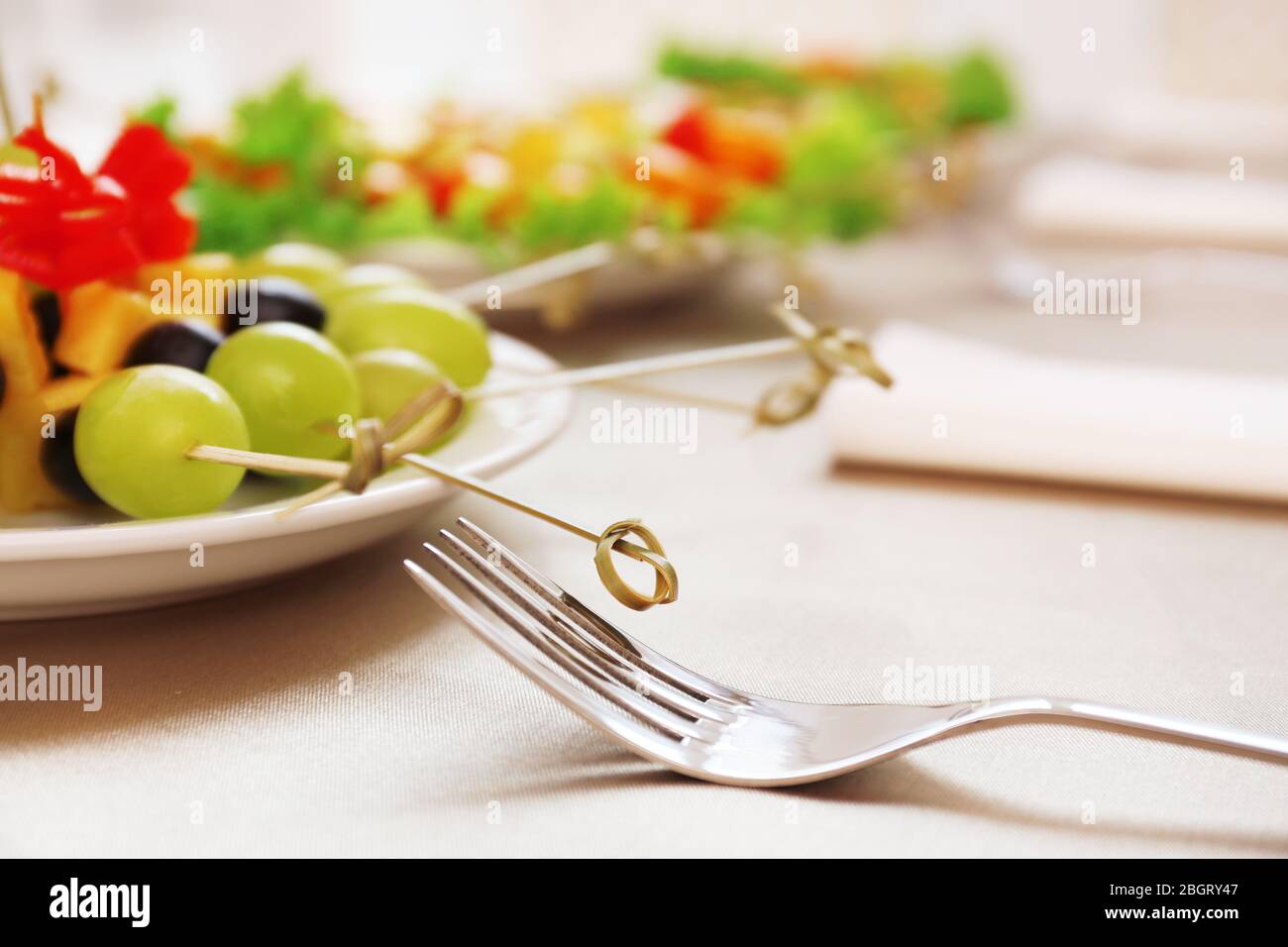 Restaurant table setting with tasty food Stock Photo - Alamy