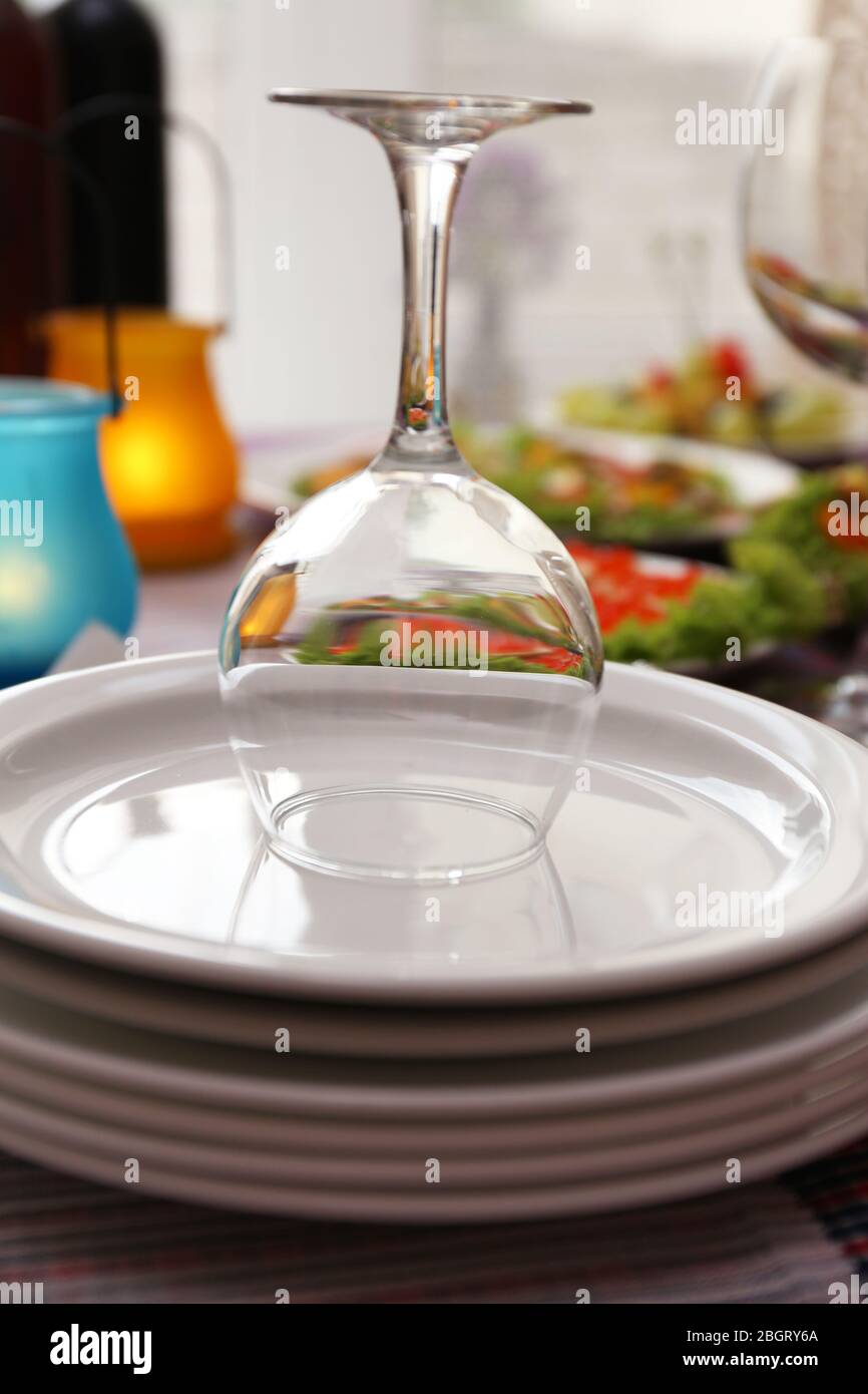Buffet table with dishware waiting for guests Stock Photo - Alamy