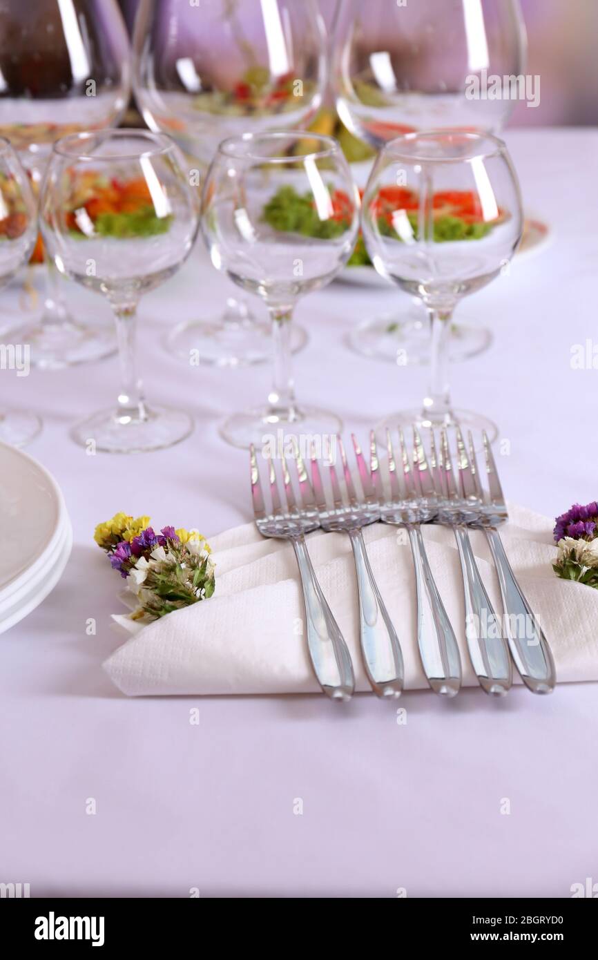Buffet table with dishware waiting for guests Stock Photo - Alamy