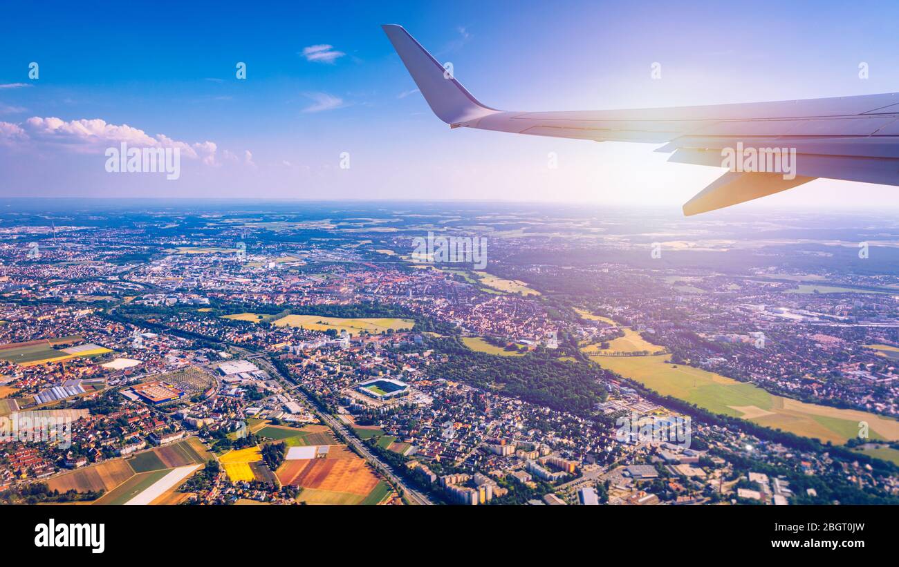 Airplane windows view above the earth on landmark down. View from an ...