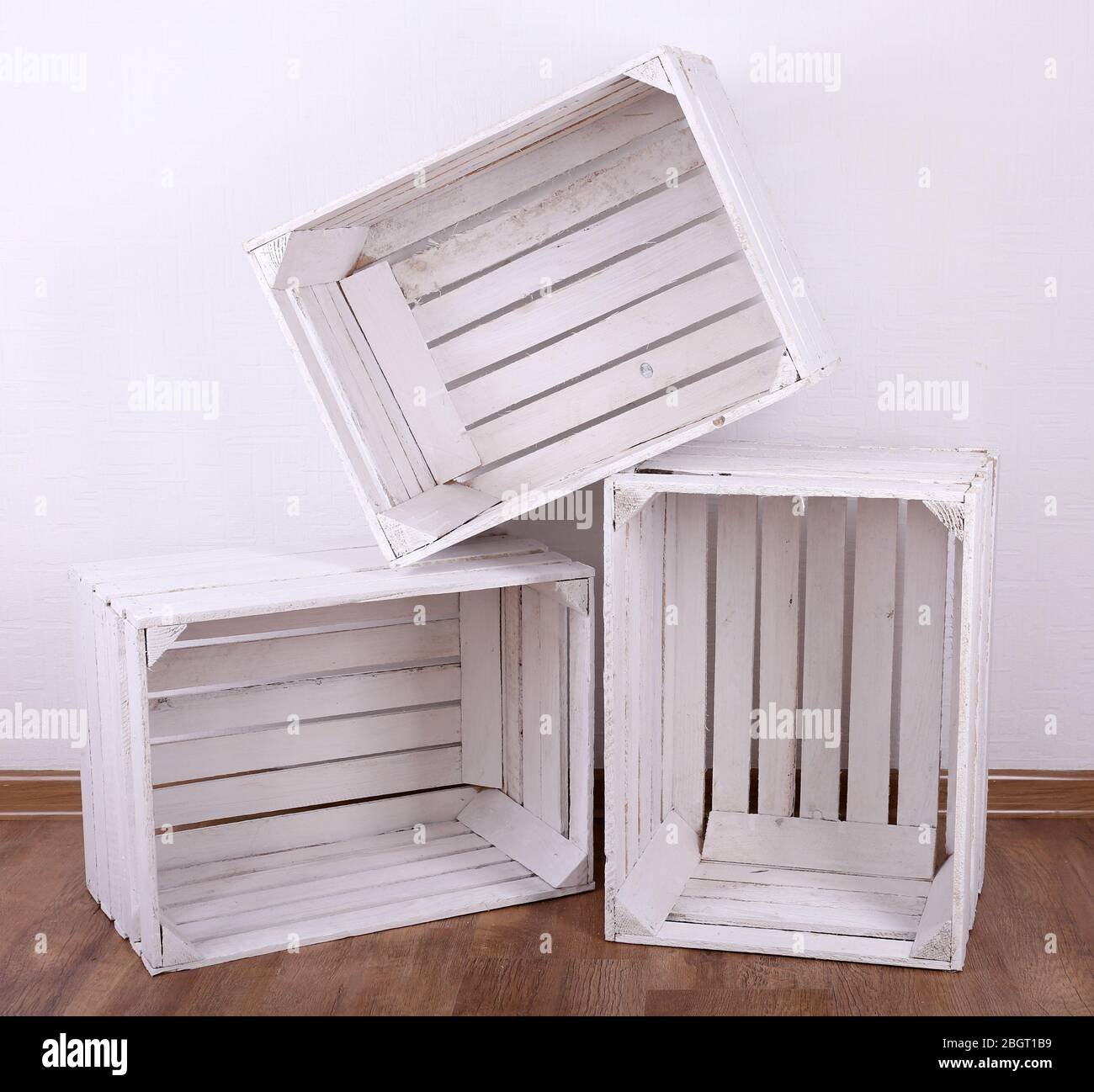 Empty wooden crates in room Stock Photo - Alamy