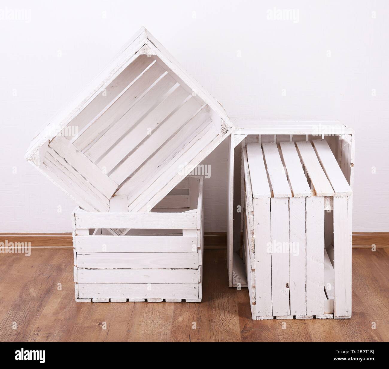 Empty wooden crates in room Stock Photo - Alamy