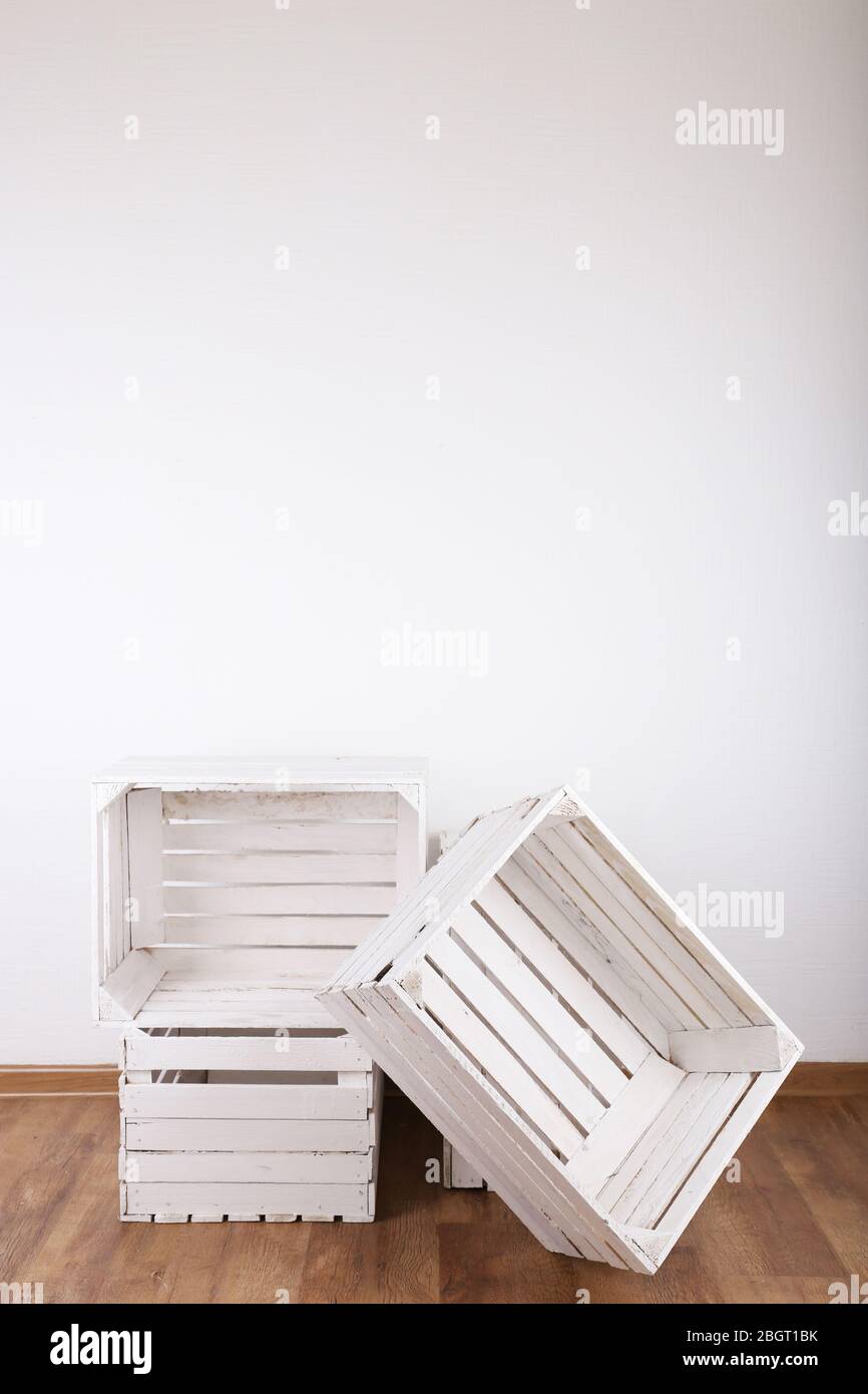 Empty wooden crates in room Stock Photo - Alamy