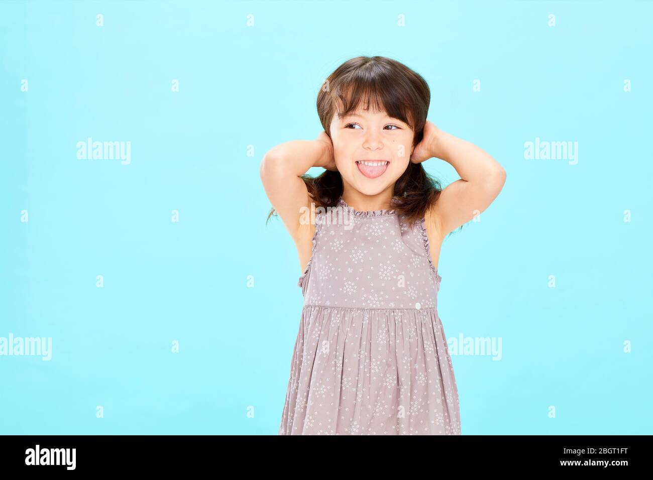 Girl 5 covering ears hi-res stock photography and images - Alamy