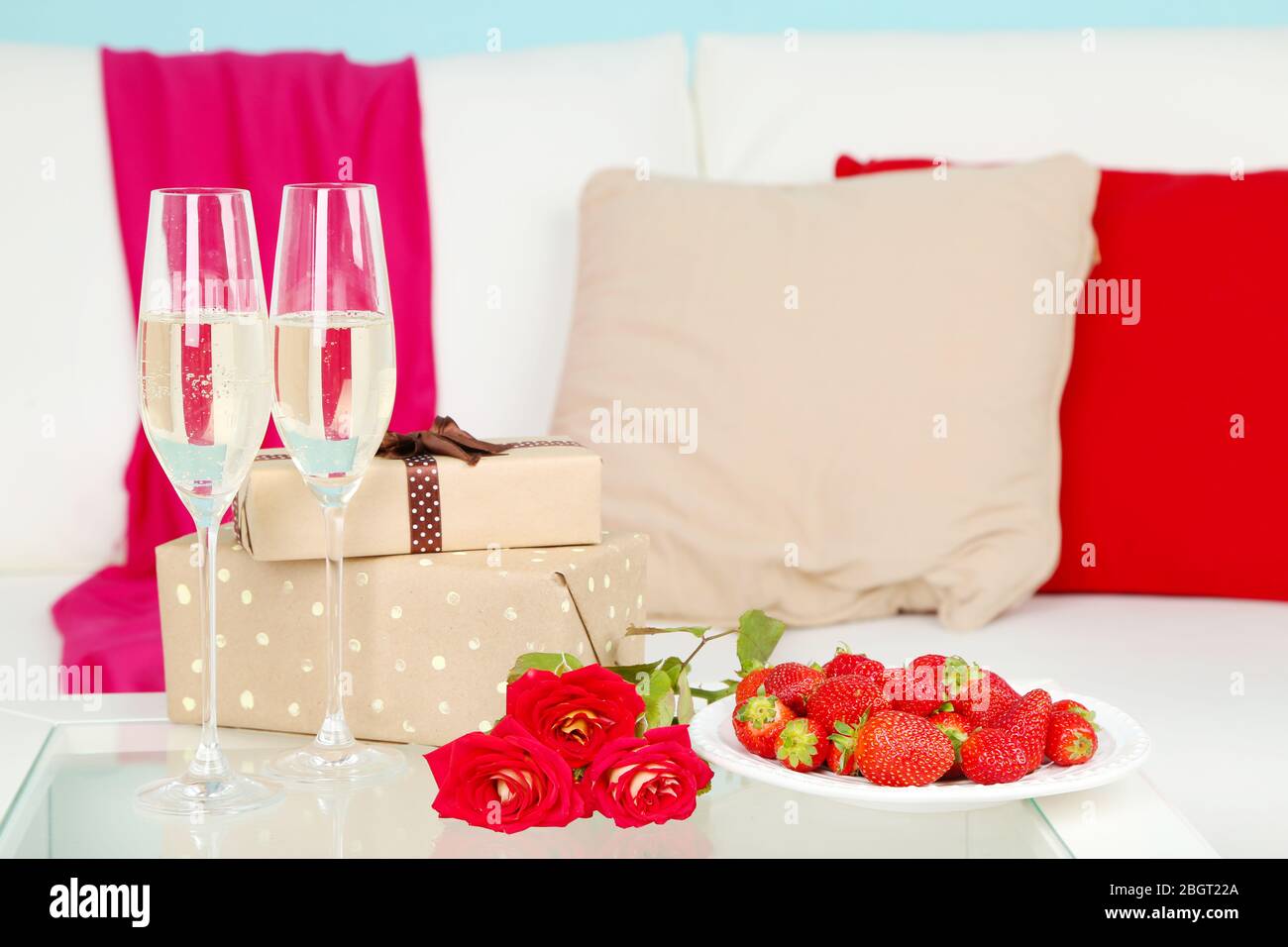 Romantic still life with champagne, strawberry and roses in room Stock ...