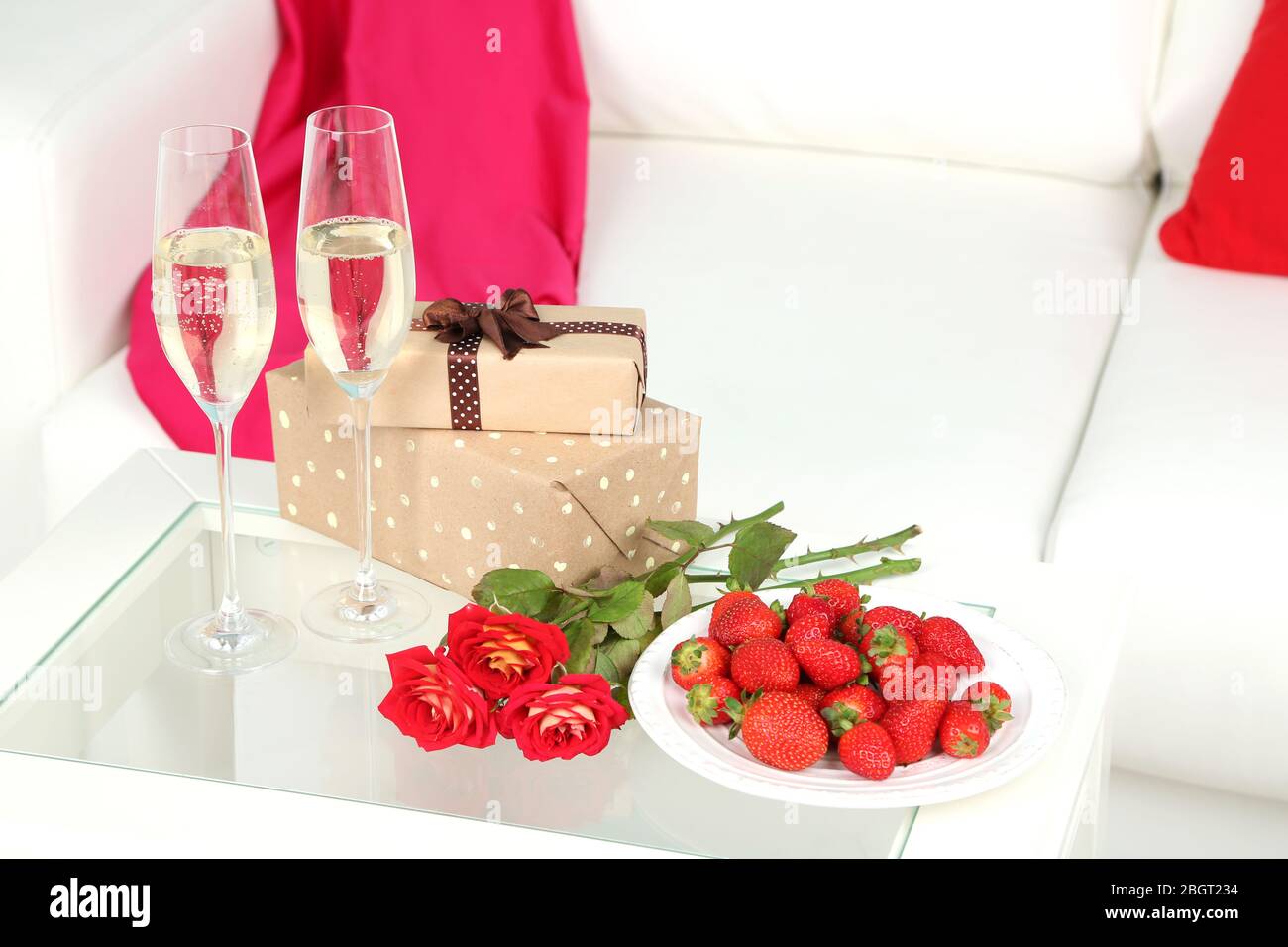 Romantic still life with champagne, strawberry and roses in room Stock ...