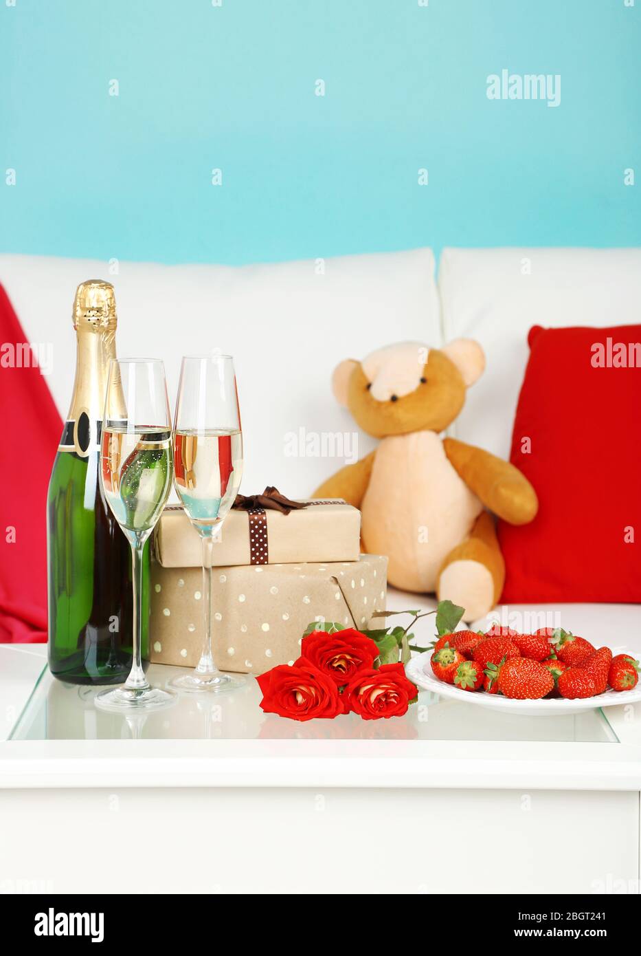 Romantic still life with champagne, strawberry and roses in room Stock ...