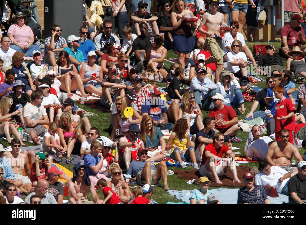 Besball fans in the left field jadrin of Salt River Fields Stadium in ...