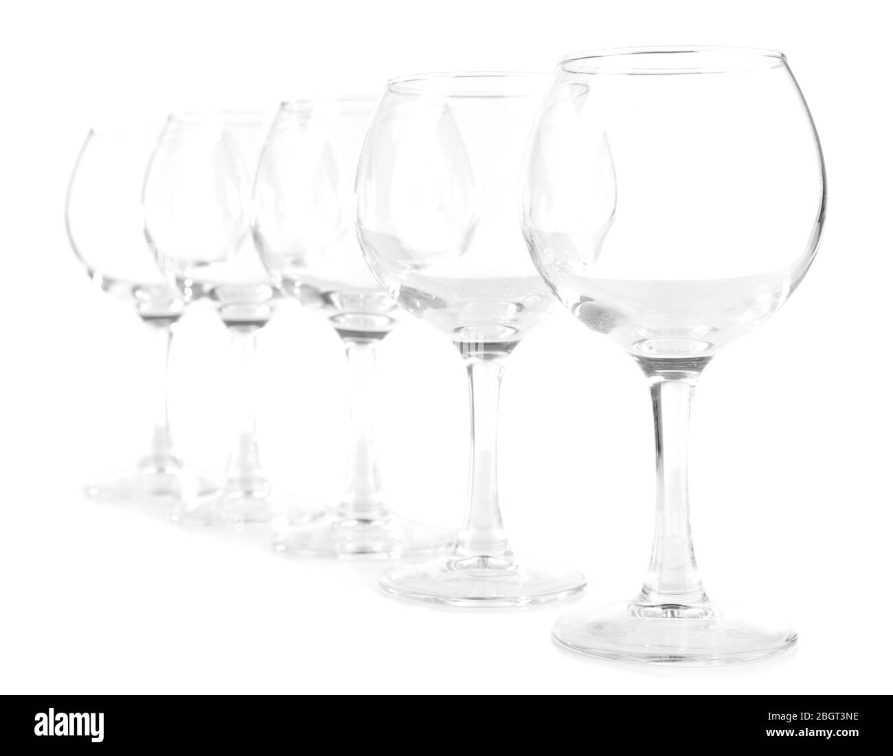 Empty wine glasses isolated on white Stock Photo - Alamy