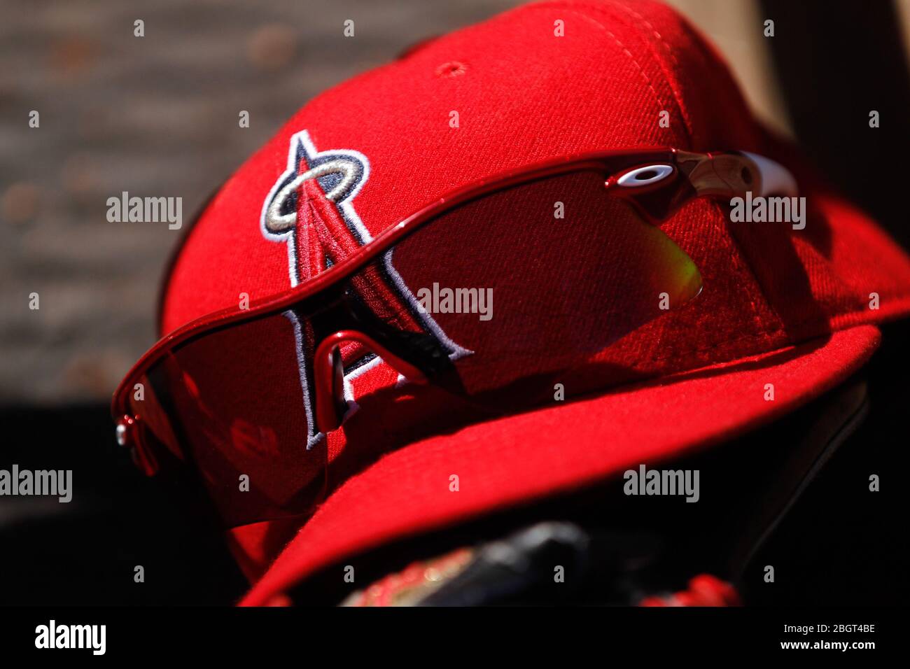 Sports glasses, sunglasses and a red cap from the California Angels ...