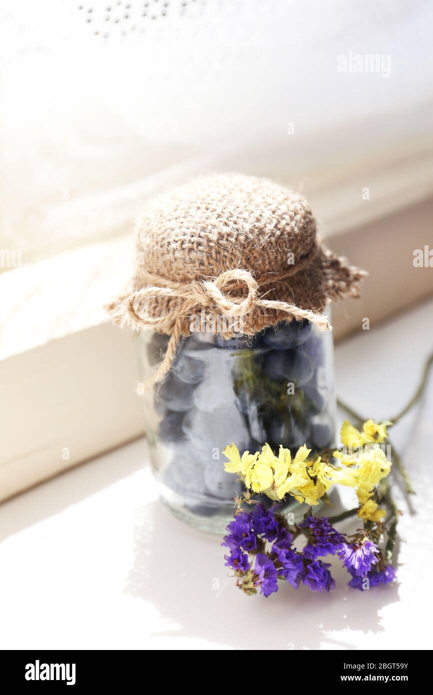 Fresh blueberries on window sill Stock Photo - Alamy