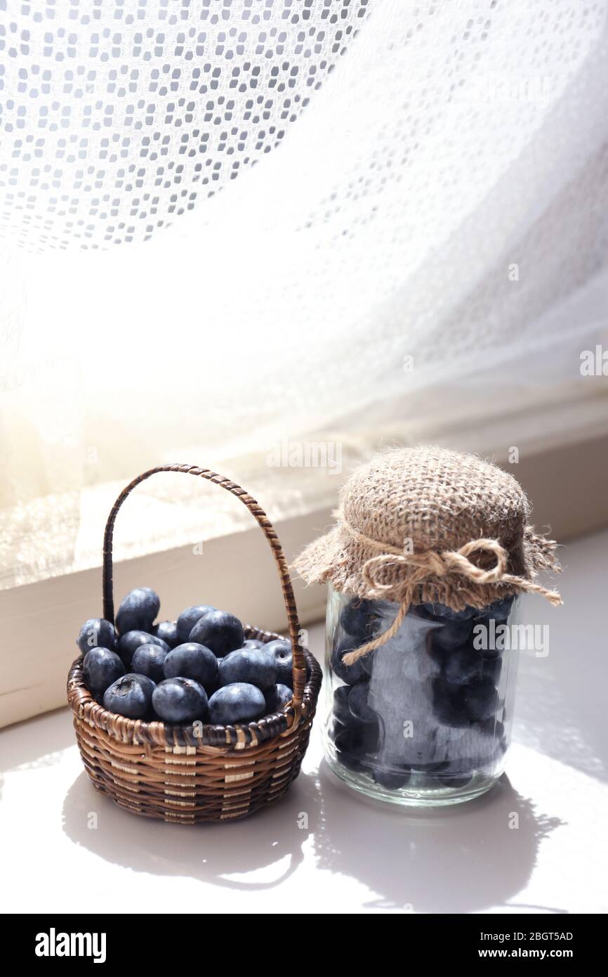 Fresh blueberries on window sill Stock Photo - Alamy