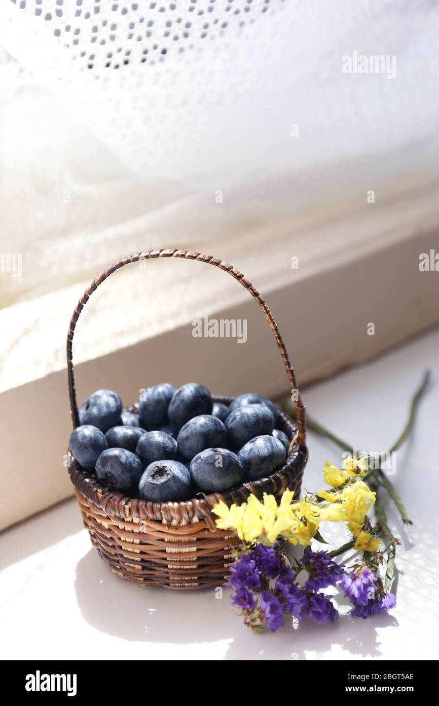 Fresh blueberries on window sill Stock Photo - Alamy