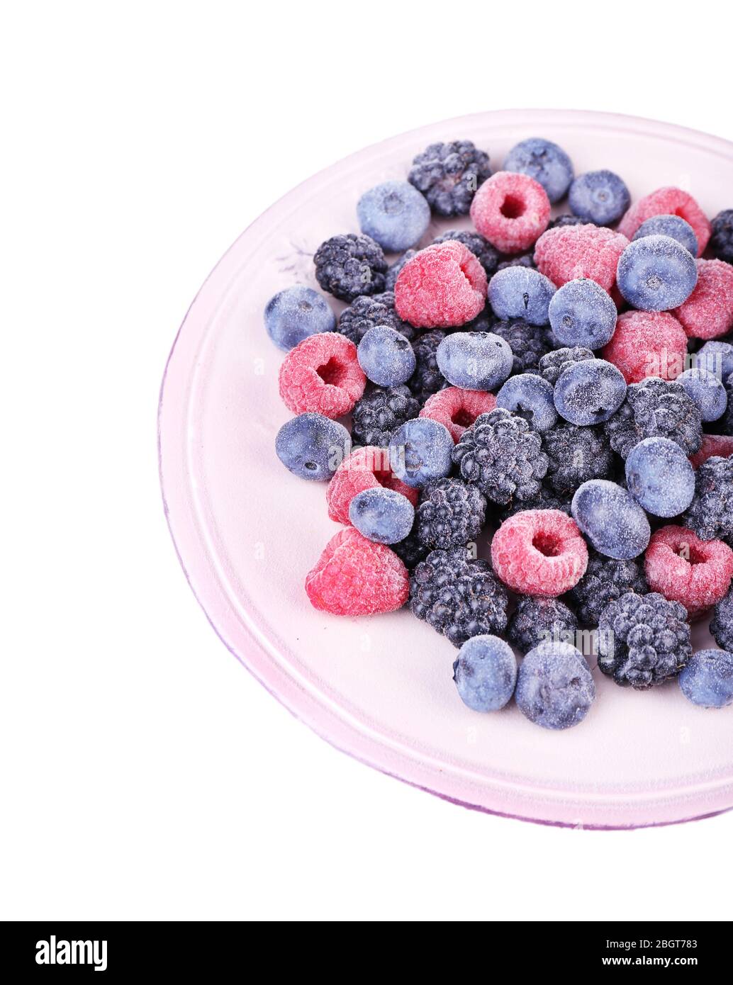 Iced berries on plate, isolated on white background Stock Photo - Alamy