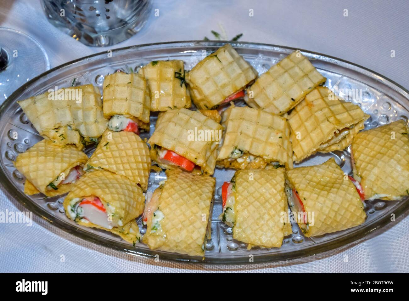 a Red caviar with mayonnaise in waffle rolls Stock Photo - Alamy
