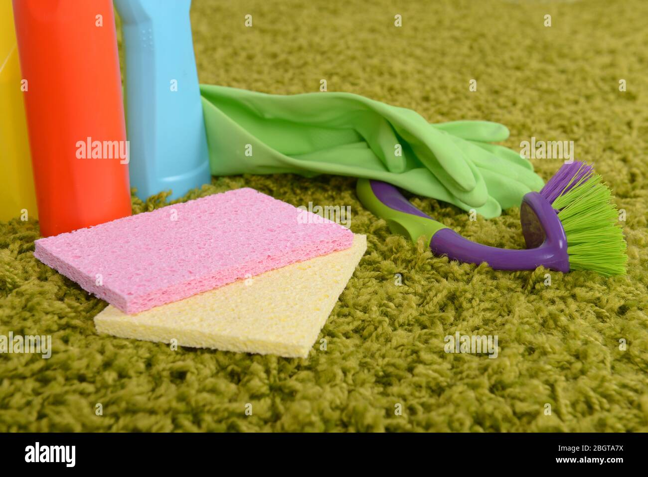 Cleaning items on carpet close up Stock Photo - Alamy