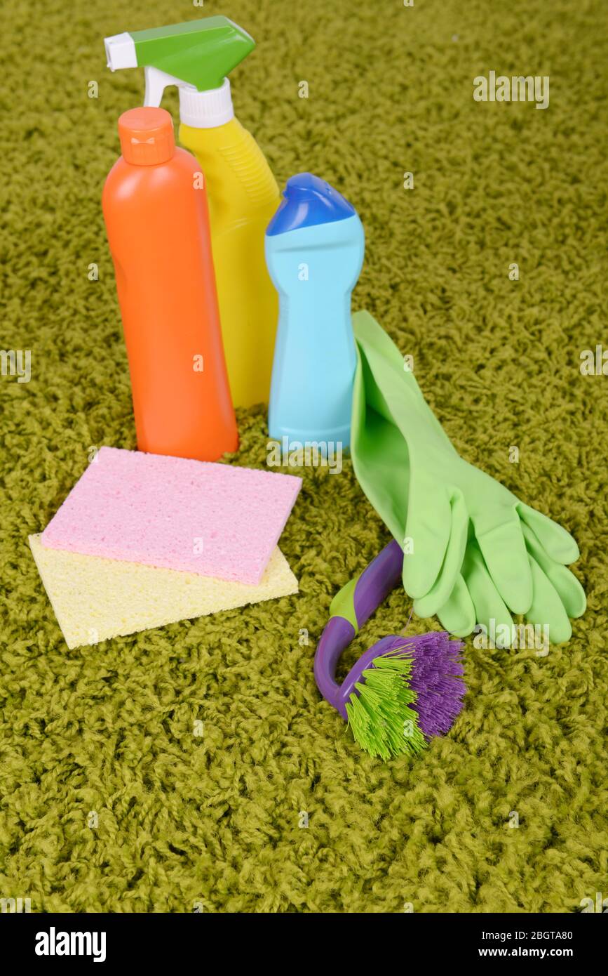 Cleaning items on carpet close up Stock Photo - Alamy