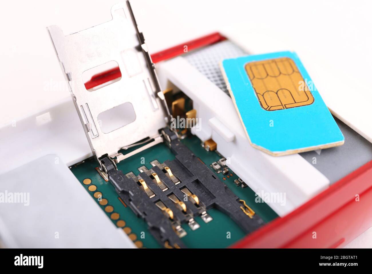 cell phone and sim card, isolated on white Stock Photo - Alamy