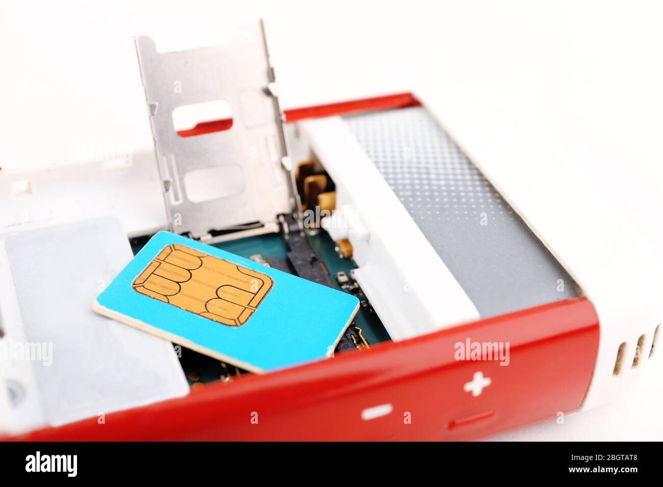 cell phone and sim card, isolated on white Stock Photo - Alamy