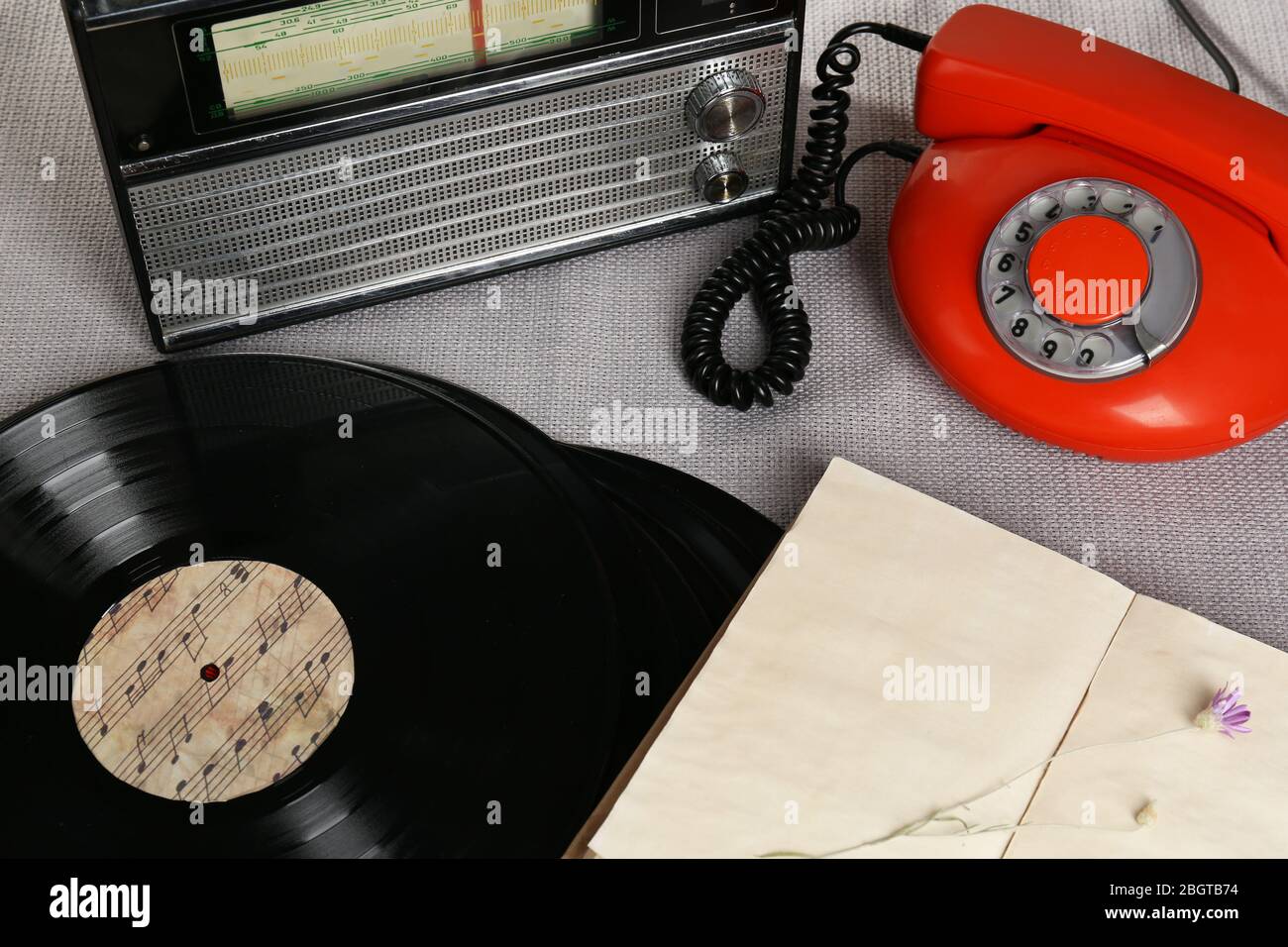 Retro composition with old phone, radio and books, close up Stock Photo ...