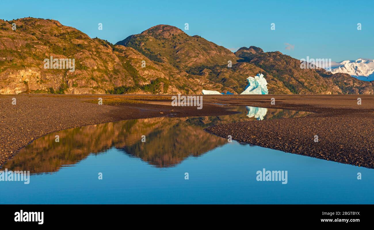 Panorama of Lago Grey (Gray Lake) at sunrise with a giant Iceberg ...