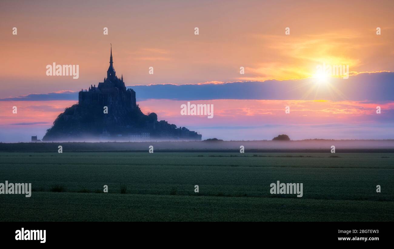 Mont Saint-Michel view in the sunrise light. Normandy, northern France ...
