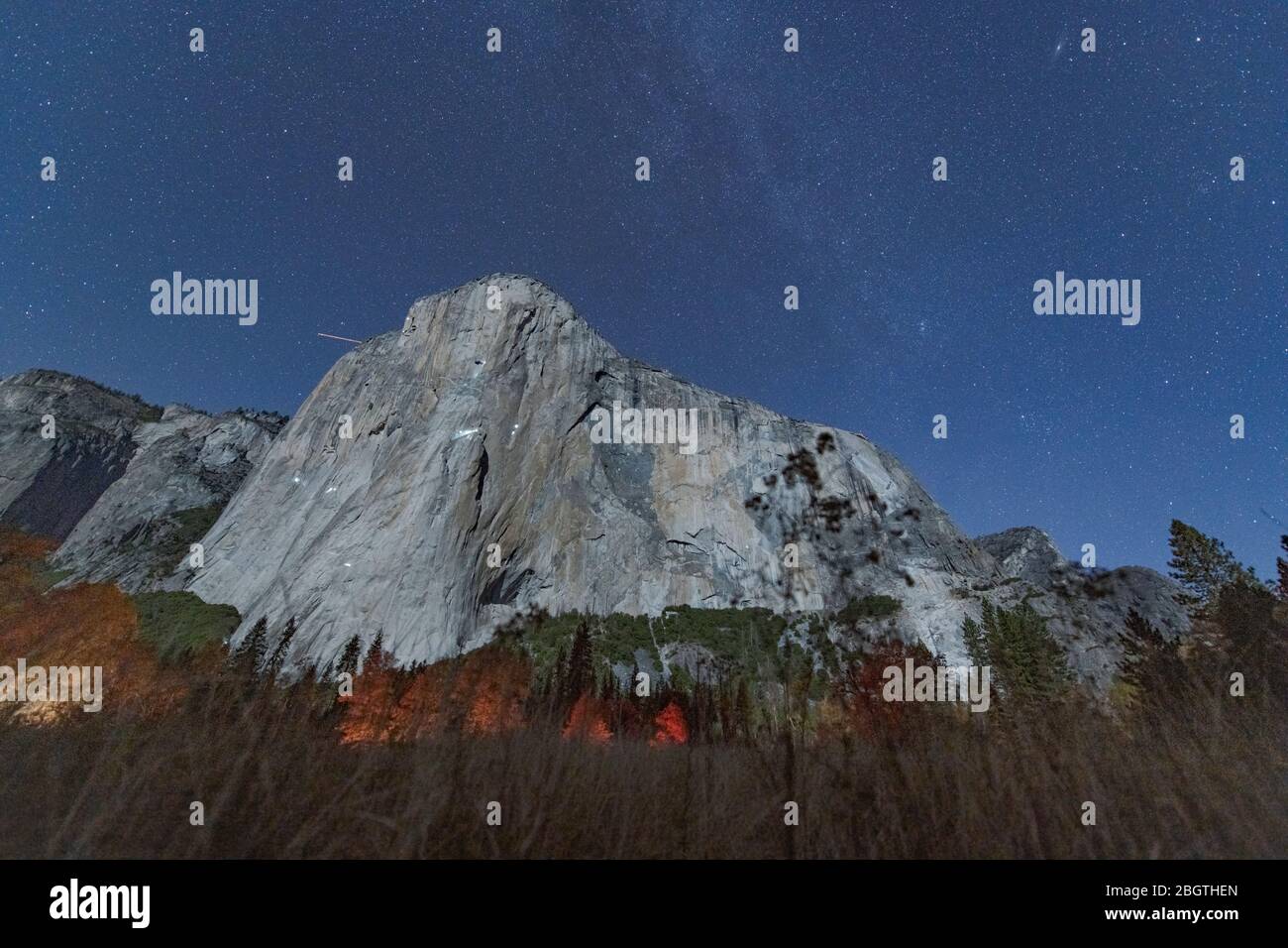 View at night of climbers on El Capitan climbing under the stars Stock ...