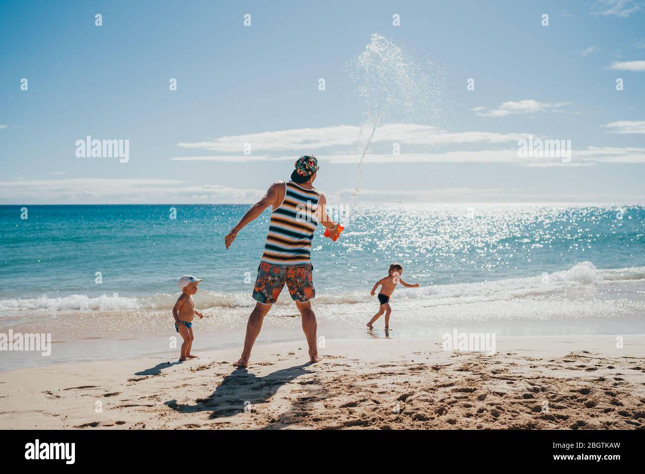 Kids playing on the beach hi-res stock photography and images - Alamy