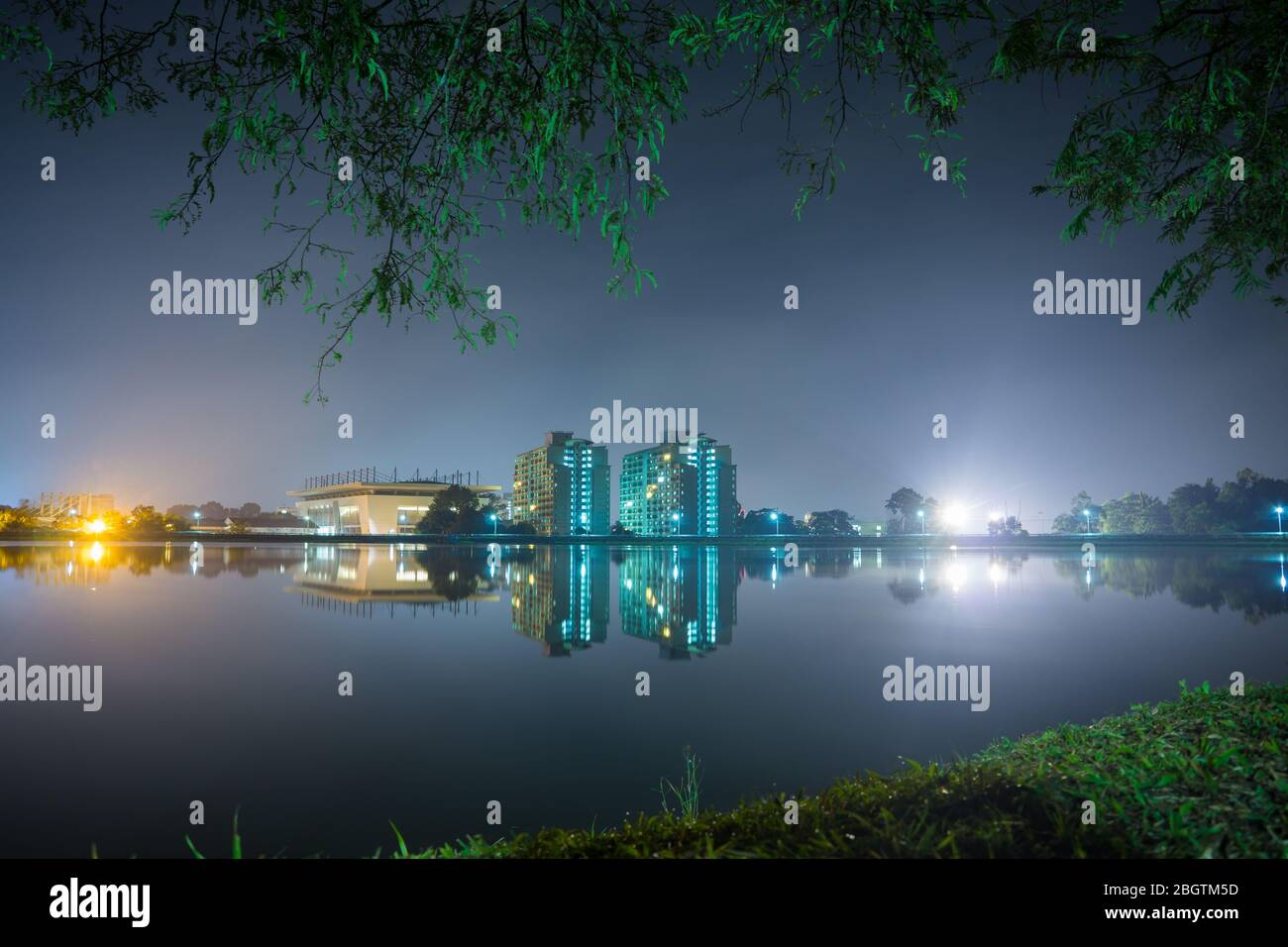 Glittering light illuminated the night, lake surface reflected the ...