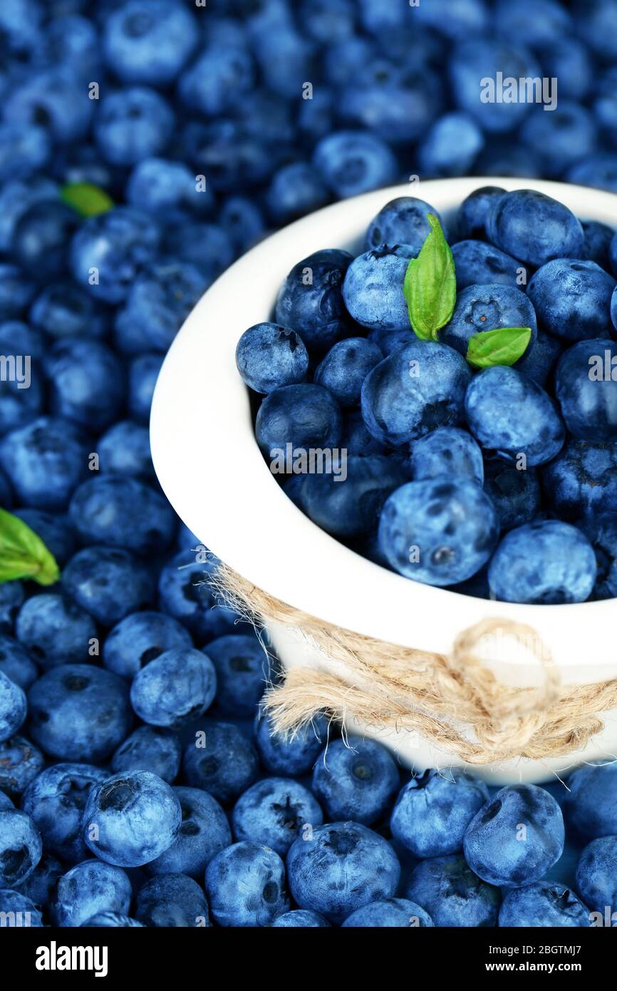 Tasty ripe blueberries in bowl, close up Stock Photo - Alamy