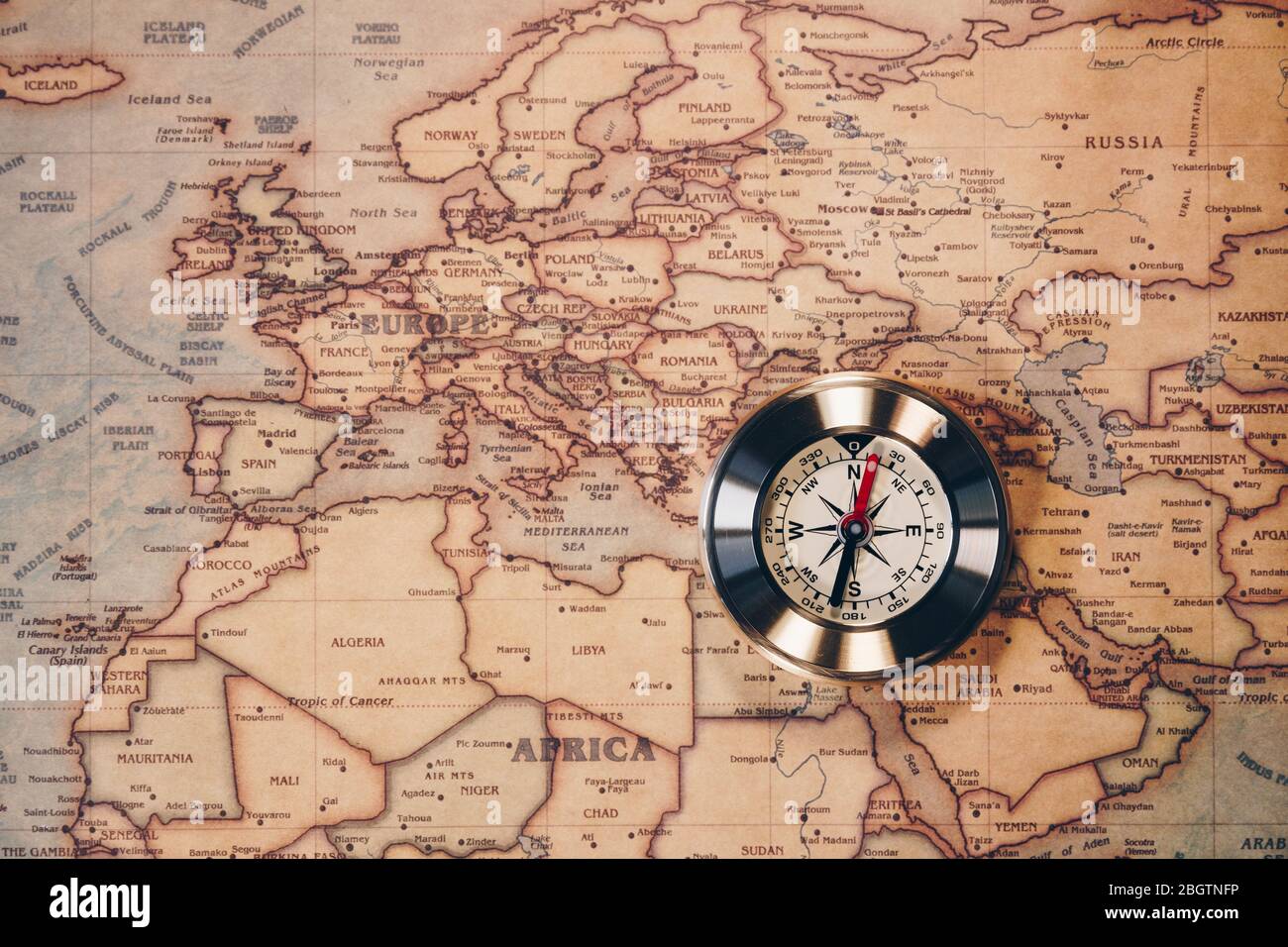 Golden Compass and the Map. Travel and Navigation Theme. Map used for ...