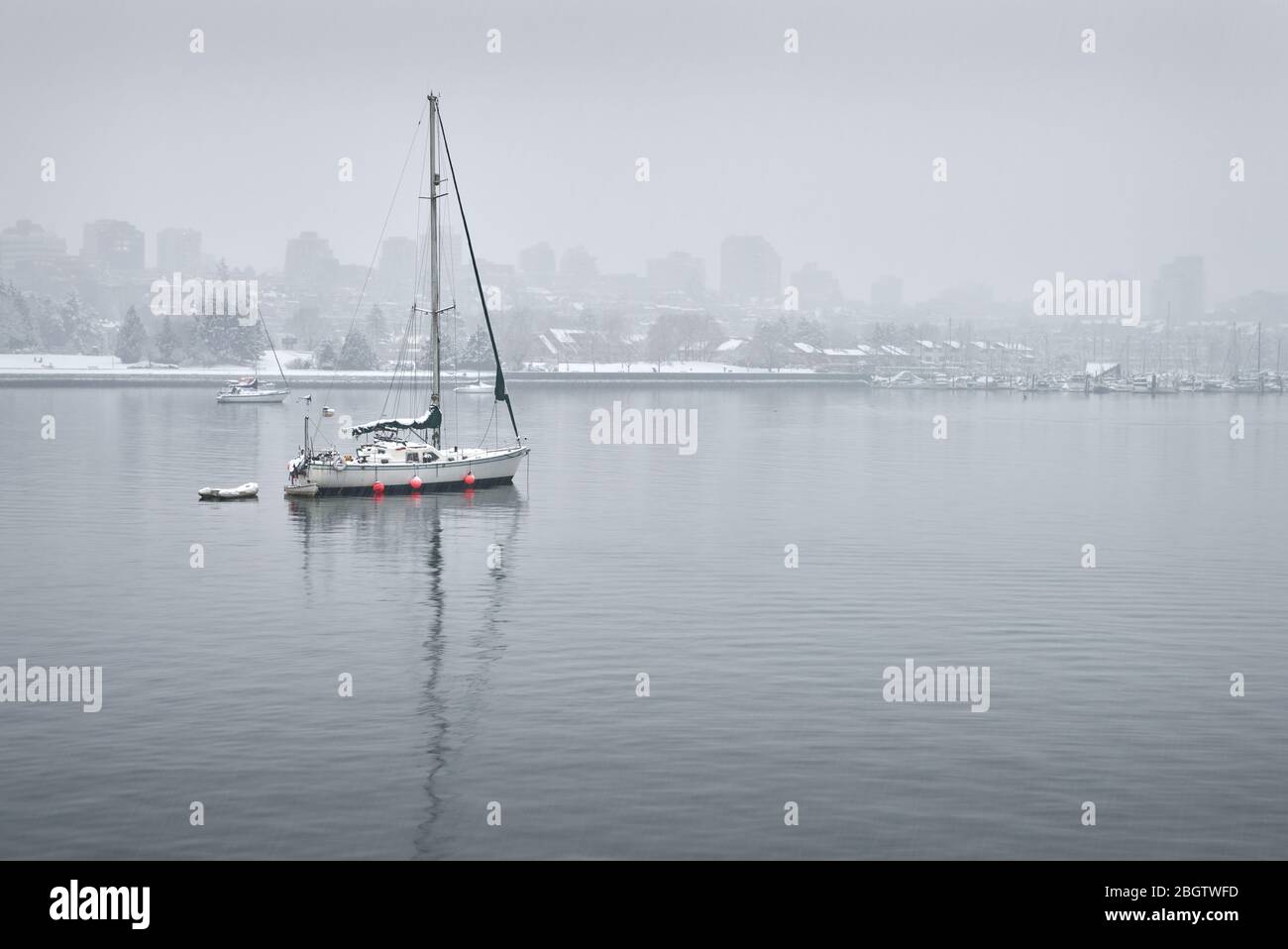False Creek Sailboat and Snow. Winter snow over False Creek, Vancouver ...
