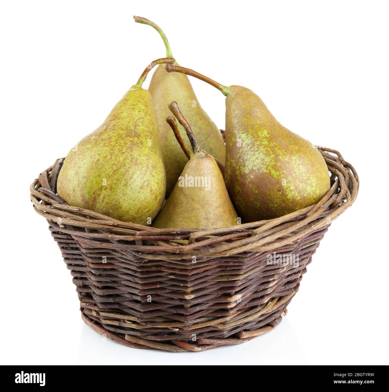 Green pears in basket Cut Out Stock Images & Pictures - Alamy