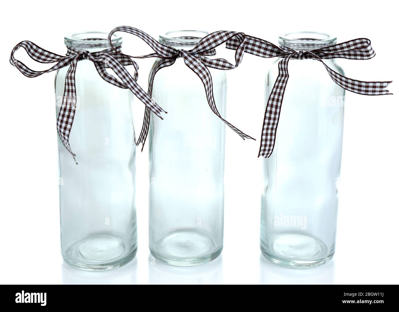 Empty bottles isolated on white Stock Photo - Alamy