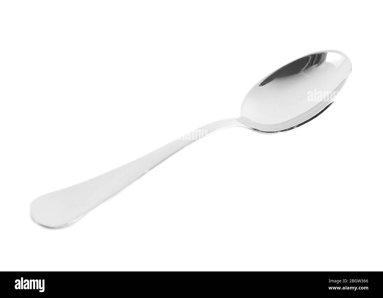 Metal spoon isolated on white Stock Photo - Alamy