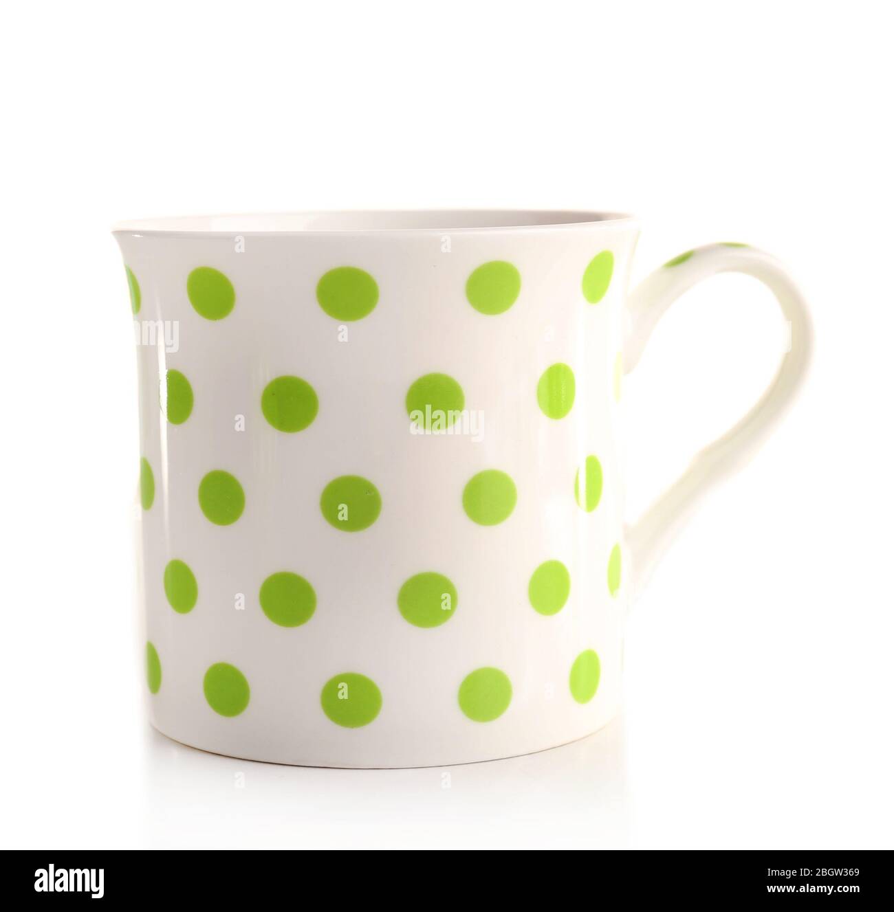 Polka dot mug isolated on white Stock Photo - Alamy