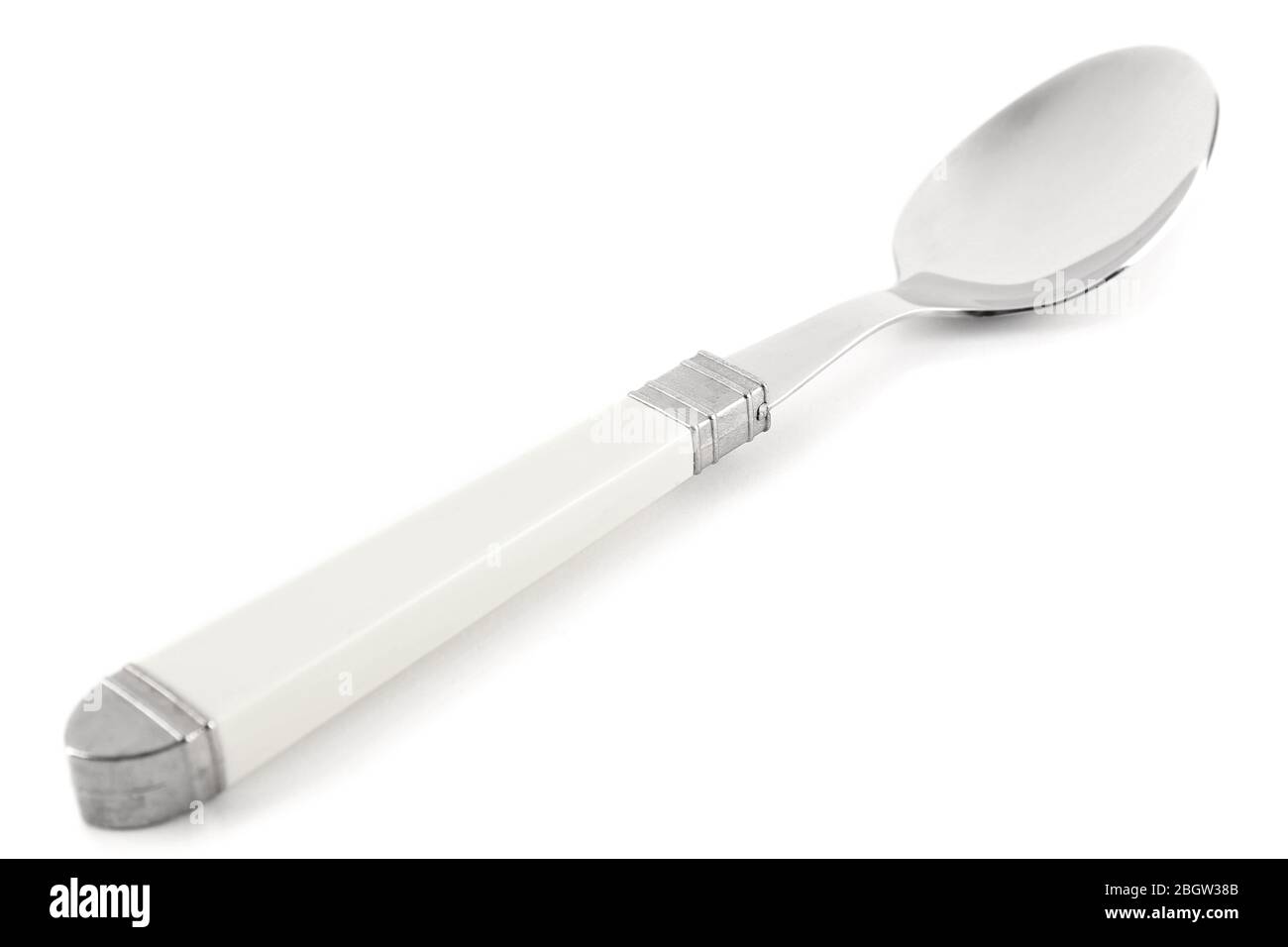 Metal spoon with plastic handle isolated on white Stock Photo - Alamy