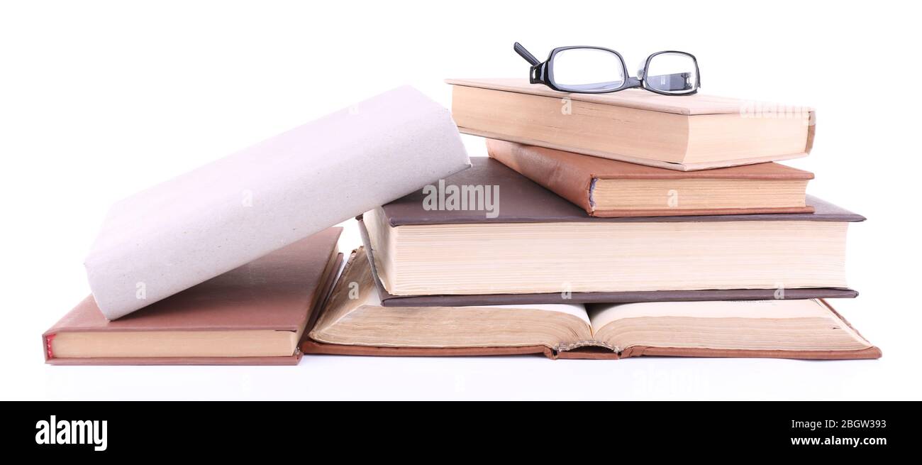 Books in a mess and glasses isolated on white Stock Photo - Alamy