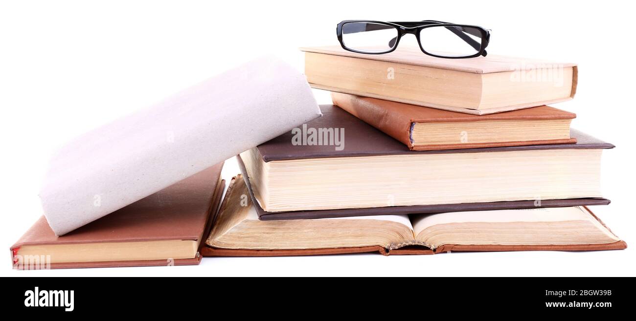 Books in a mess and glasses isolated on white Stock Photo - Alamy
