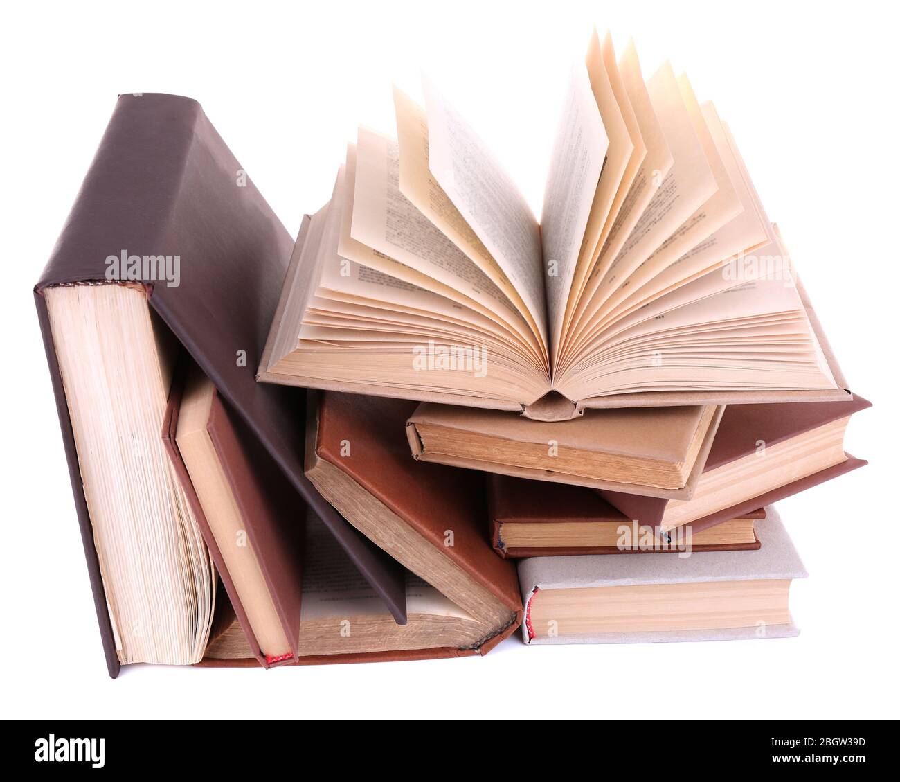 Books in a mess isolated on white Stock Photo - Alamy