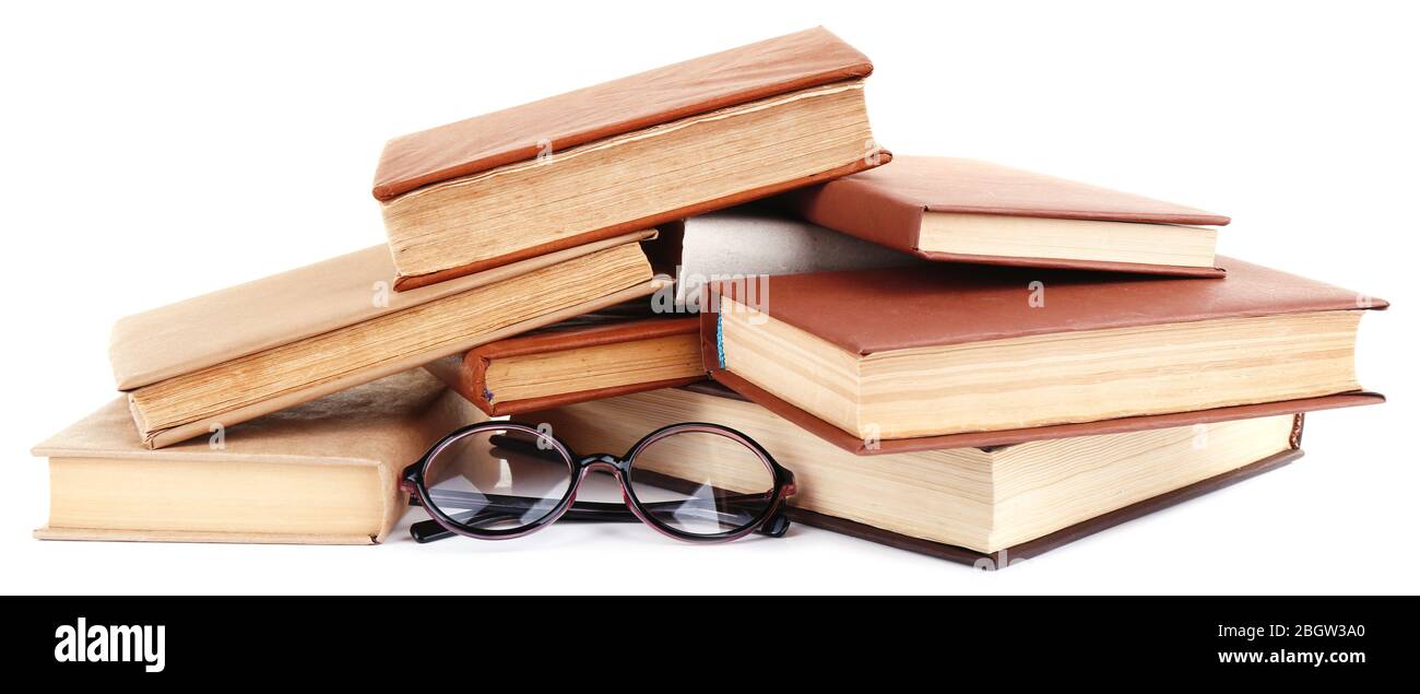 Books in a mess and glasses isolated on white Stock Photo - Alamy