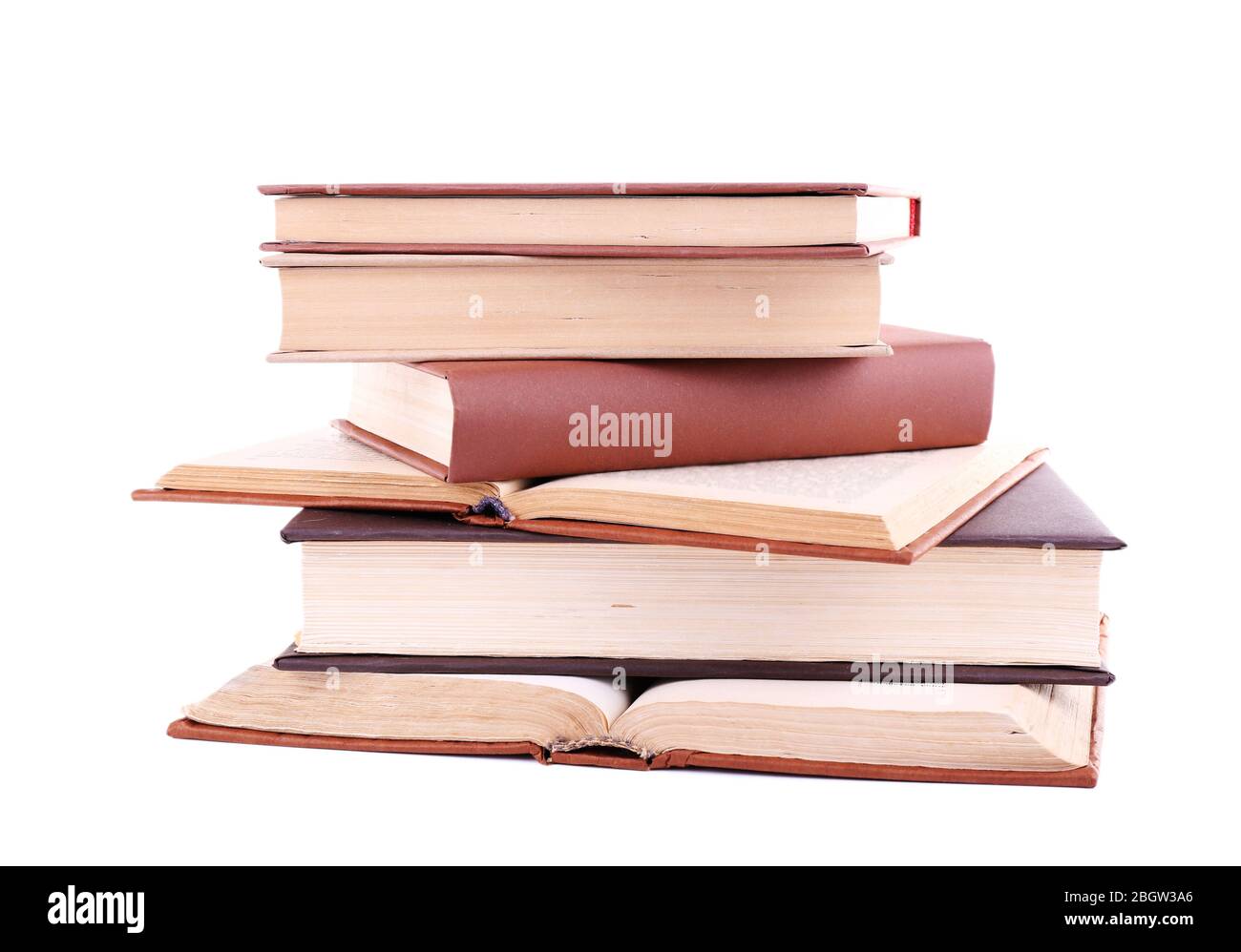 Books in a mess isolated on white Stock Photo - Alamy