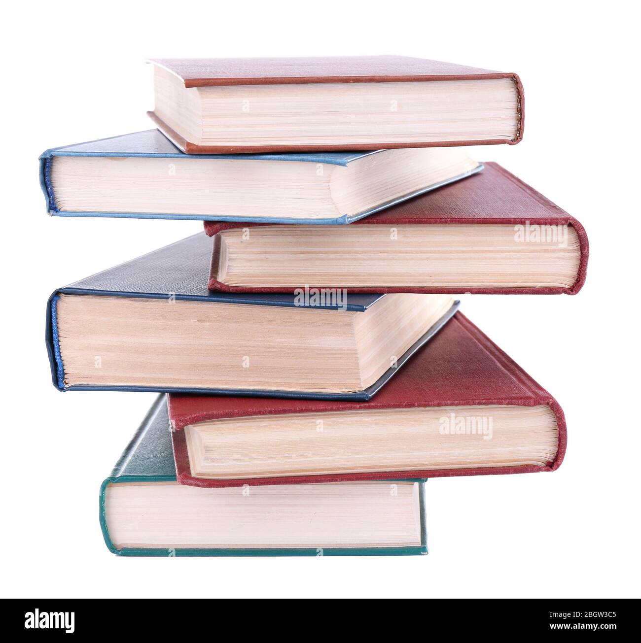 Books in a mess isolated on white Stock Photo - Alamy