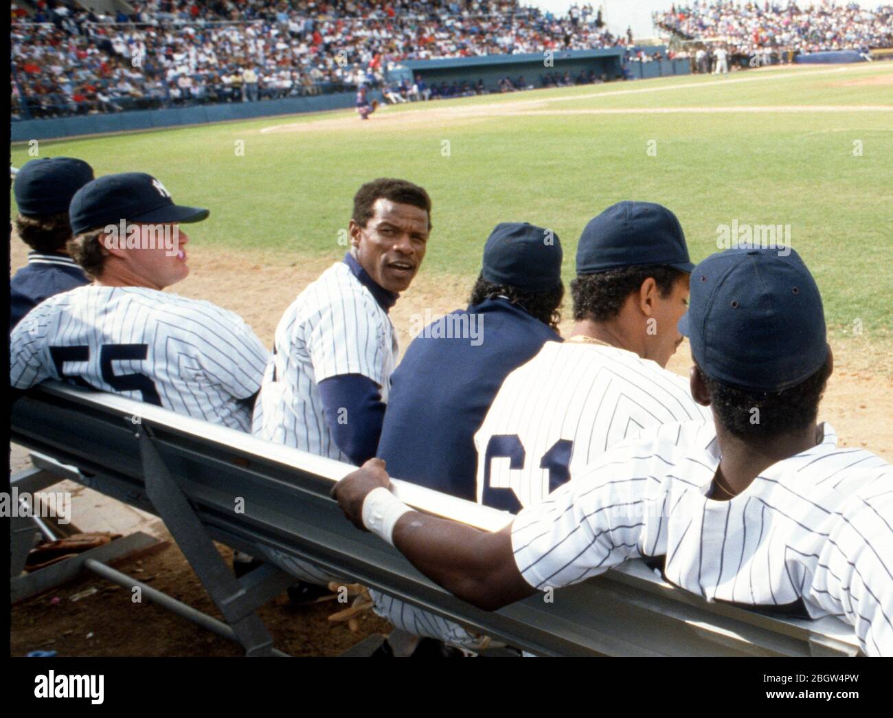 Yankees Rickey Henderson, third from left, with teammates and coaches ...