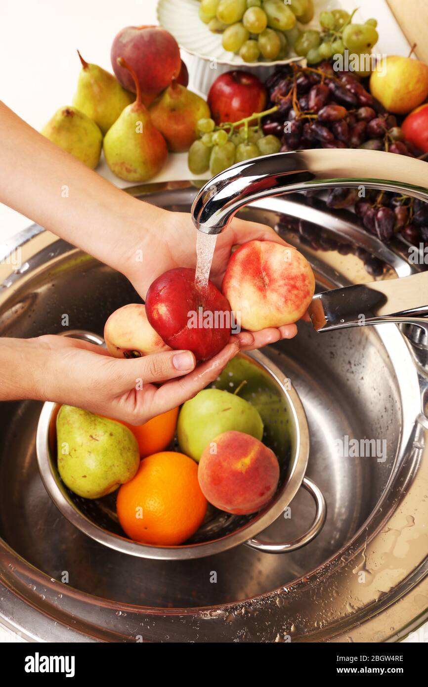 Wash peaches in water hi-res stock photography and images - Alamy