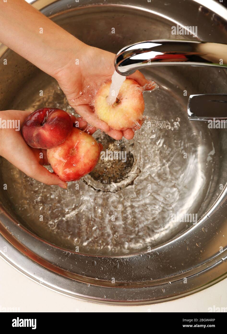 Washing peach hi-res stock photography and images - Alamy