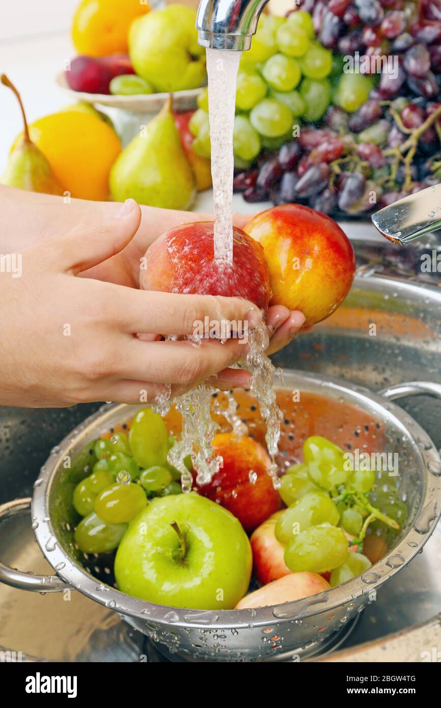Wash peaches in water hi-res stock photography and images - Alamy