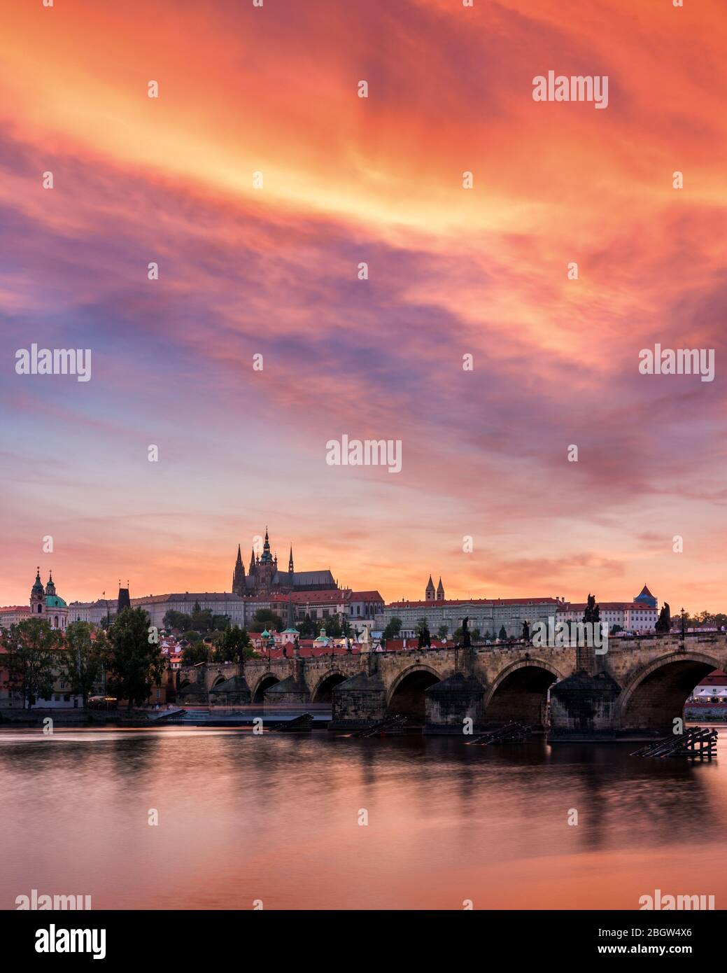 Charles Bridge at sunset with colorful sky, Prague, Czech Republic ...